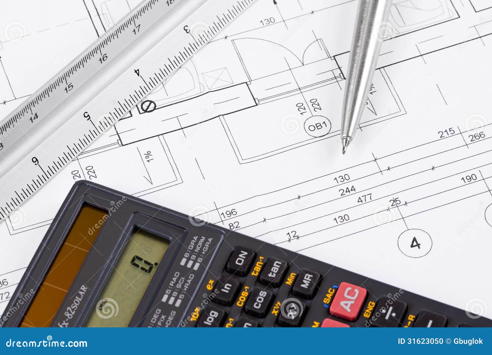 Calculator on a blueprint stock photo. Image of architecture - 31623050