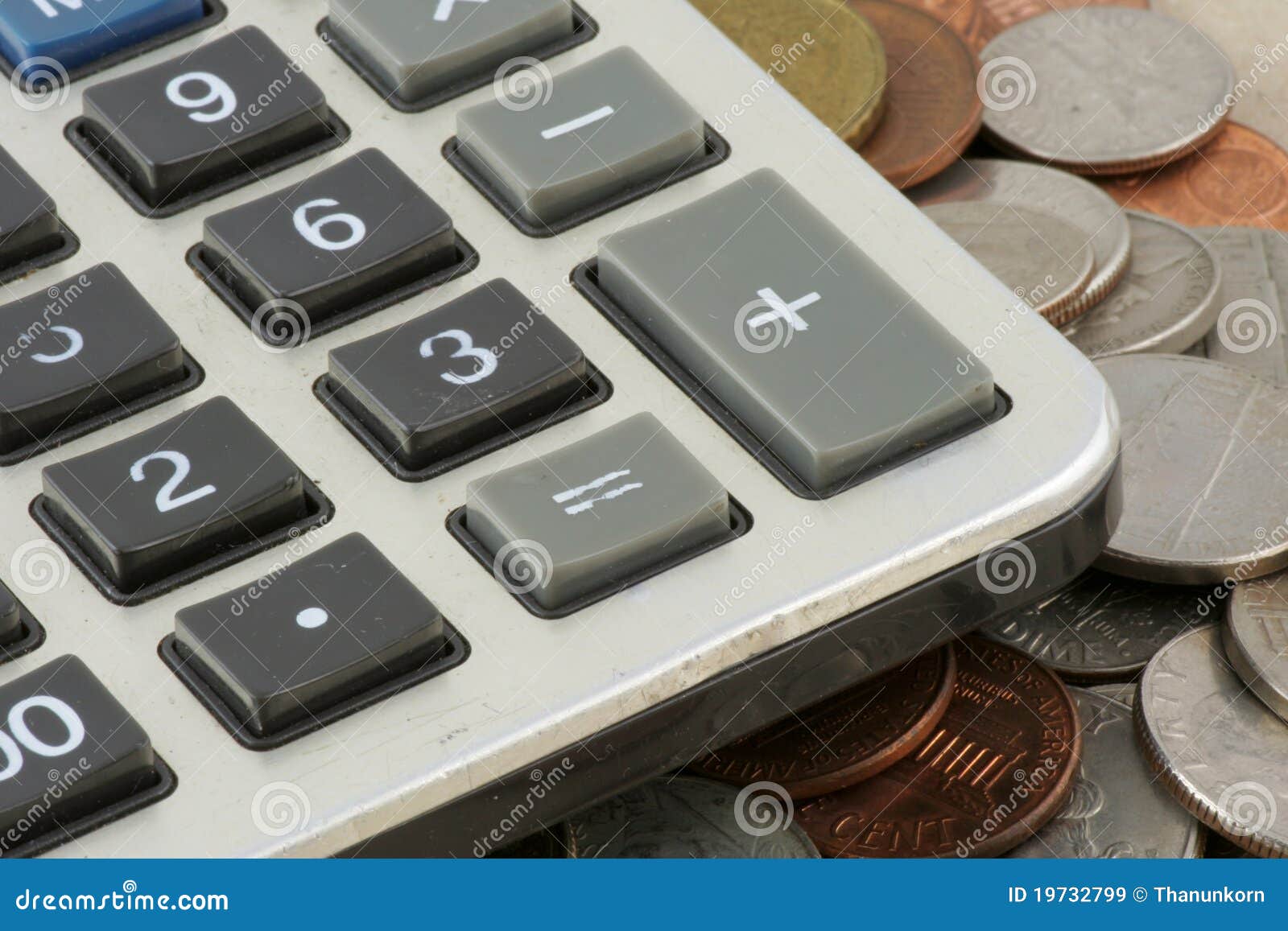 Calculator on coins stock image. Image of economy, isolated - 19732799