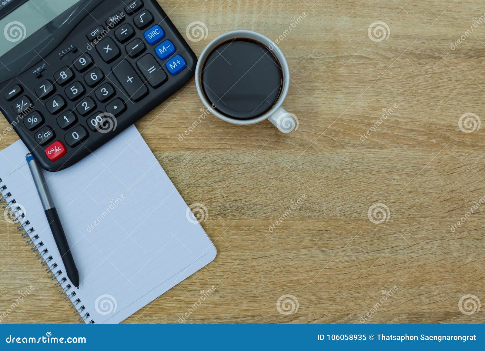 Calculator and Cup of Coffee with Note on Working Table with Cop Stock ...
