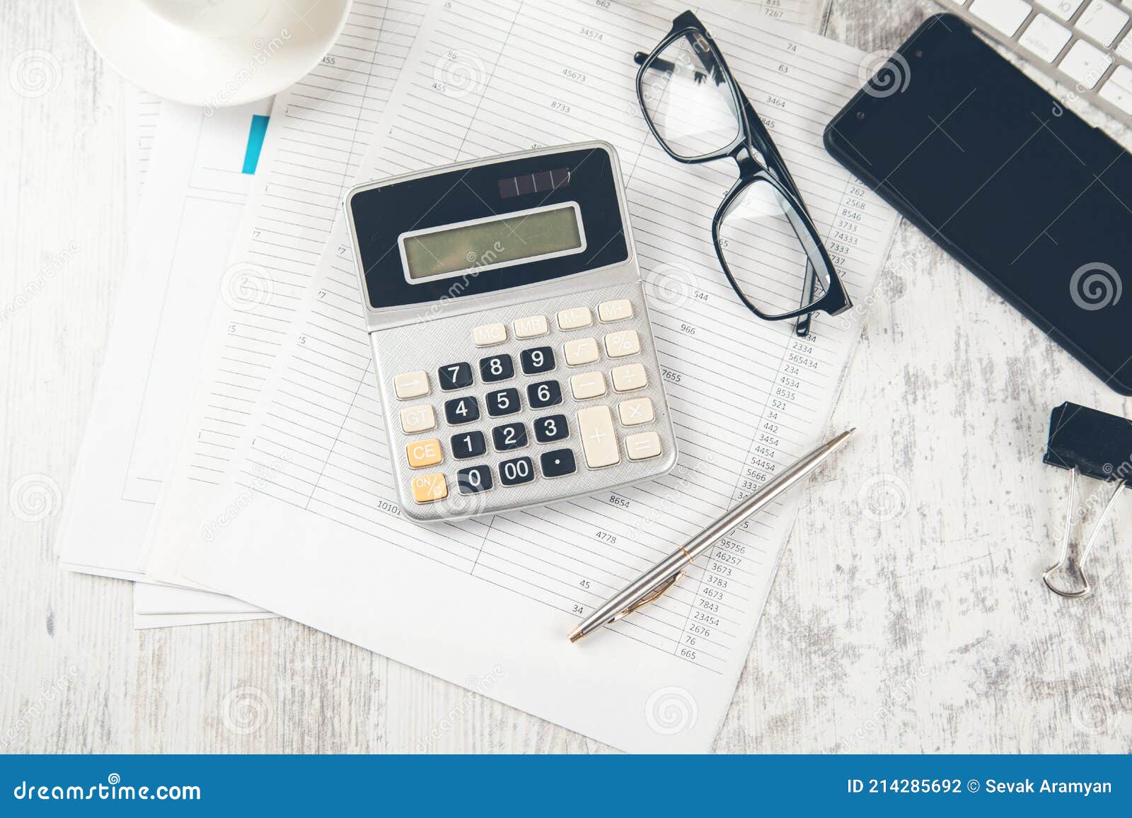 Calculator on Document and Computer on Desk. Stock Photo - Image of ...
