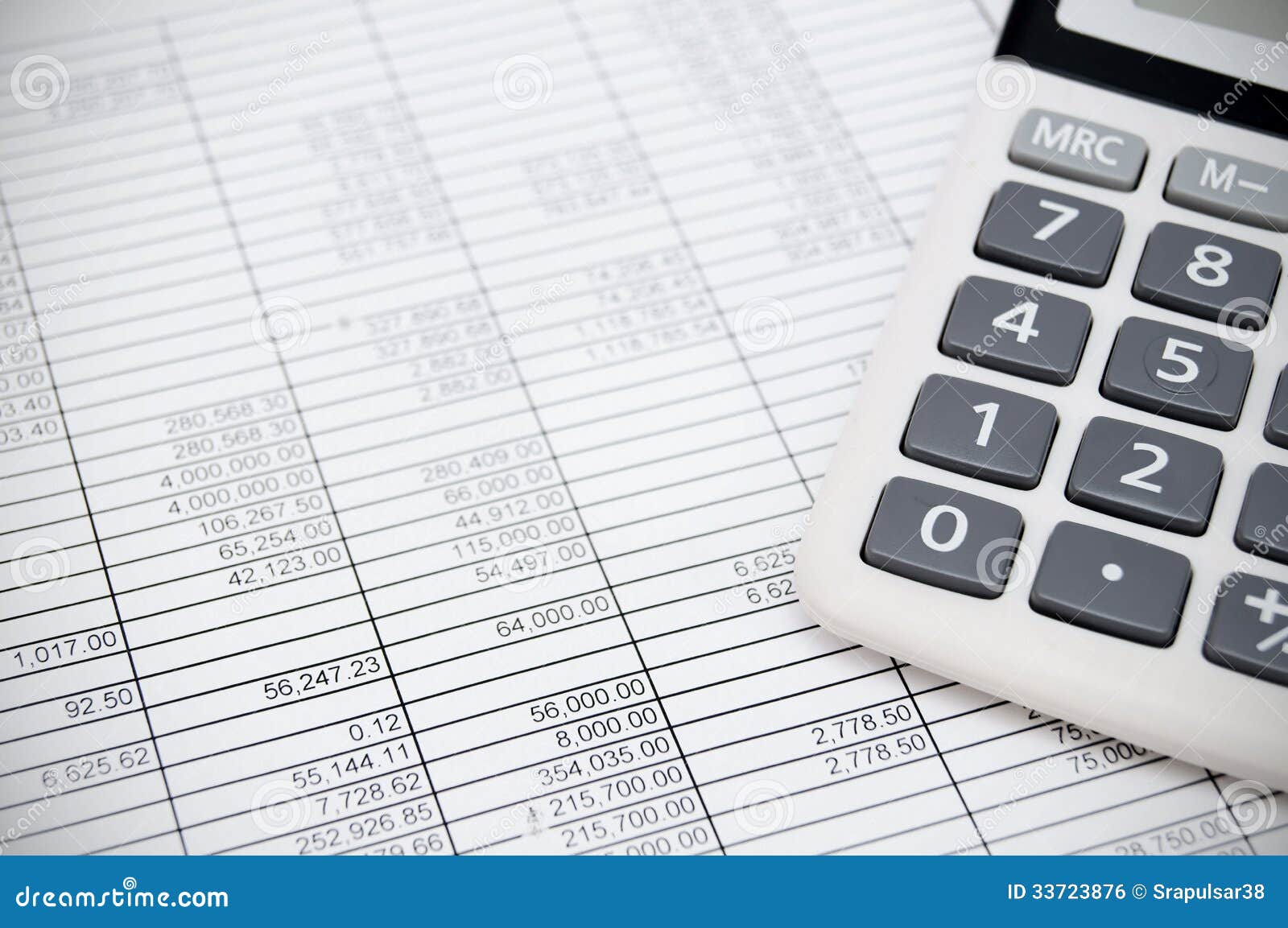Calculator on documents. stock photo. Image of calculator - 33723876