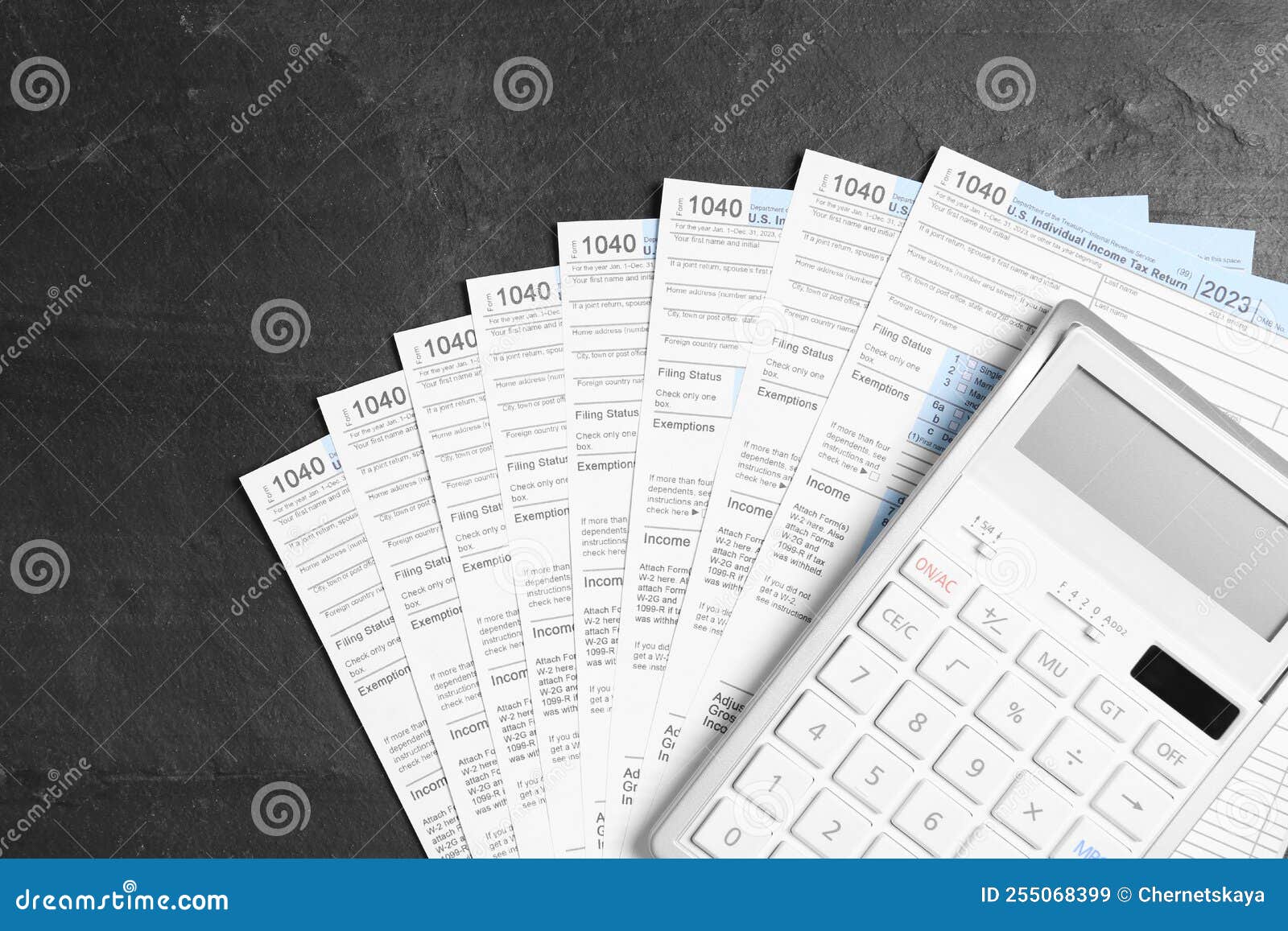 Calculator and Documents on Stone Table, Top View. Tax Accounting ...