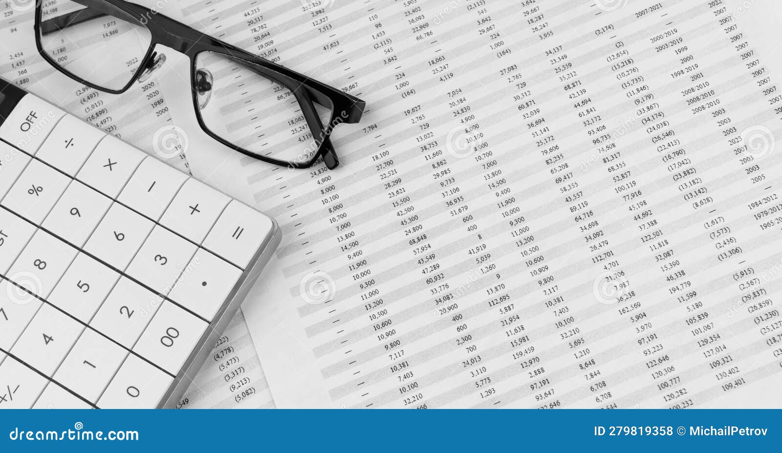 Calculator and Eye Glasses on Financial Statement Stock Photo - Image ...