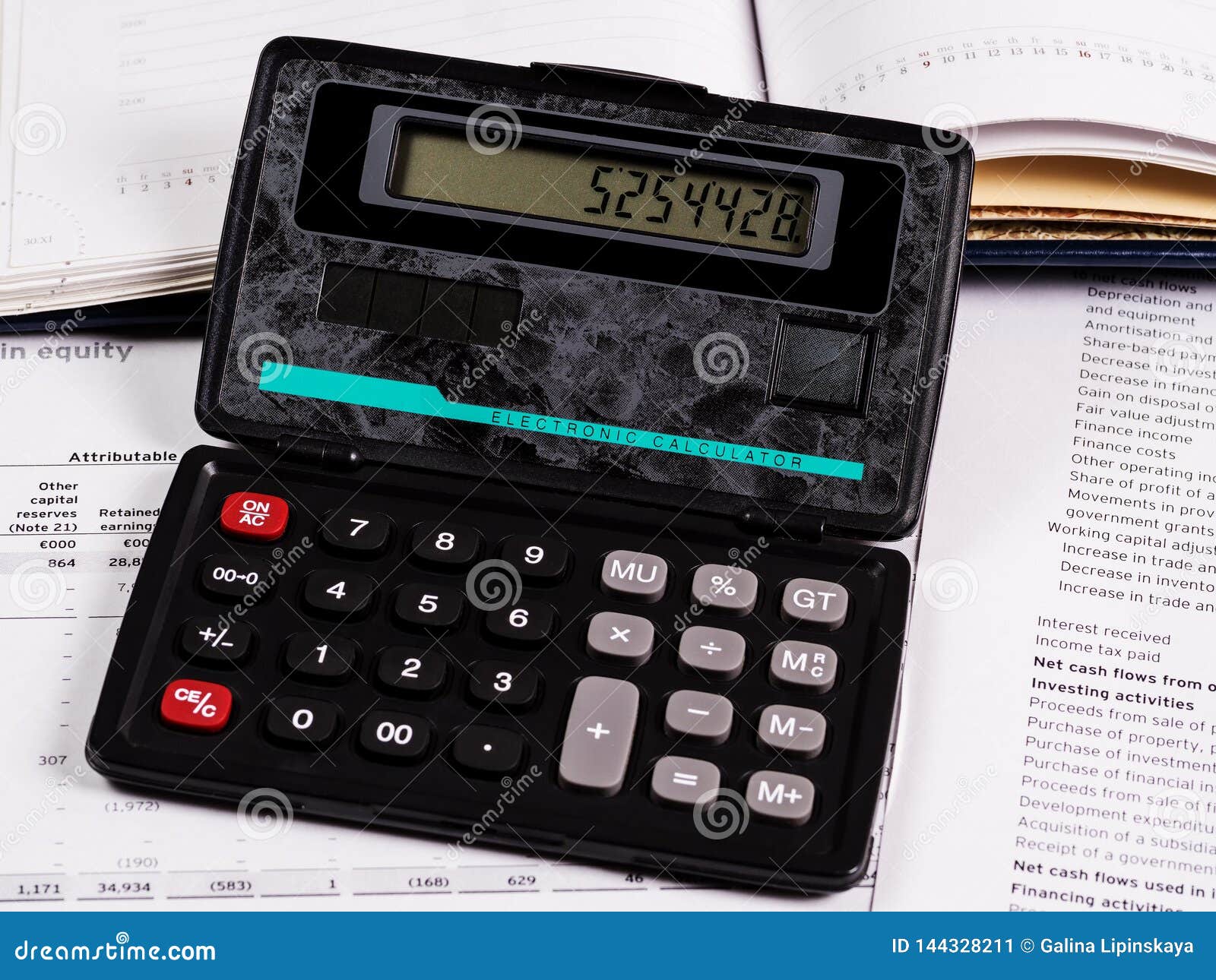 Calculator and Financial Documents on the Table Stock Image - Image of ...