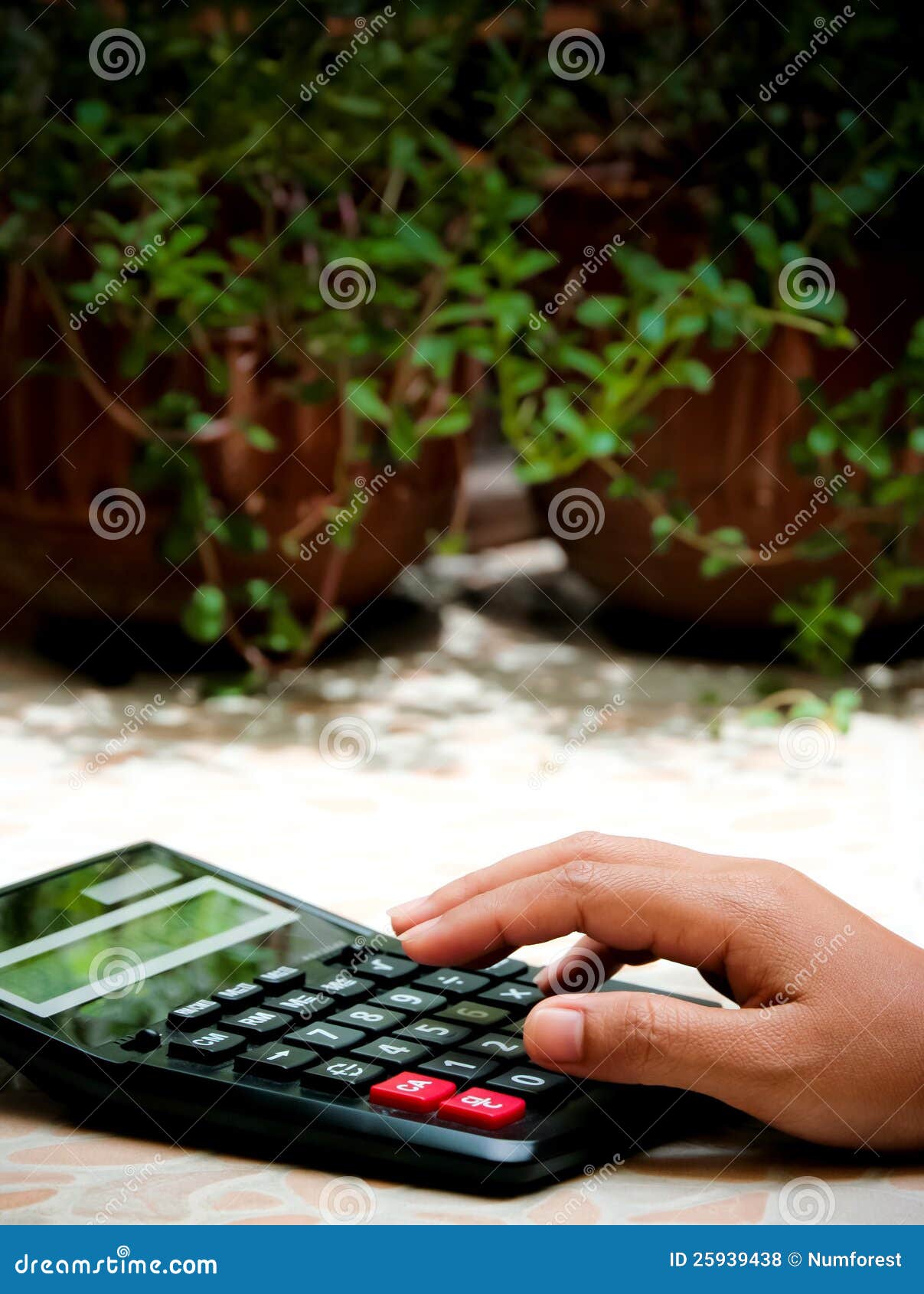 Calculator on hand stock photo. Image of number, mathematics - 25939438