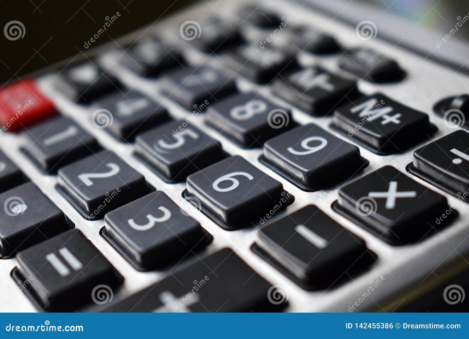 Calculator Black Keys with White Numbers and One Red Button Stock Photo ...