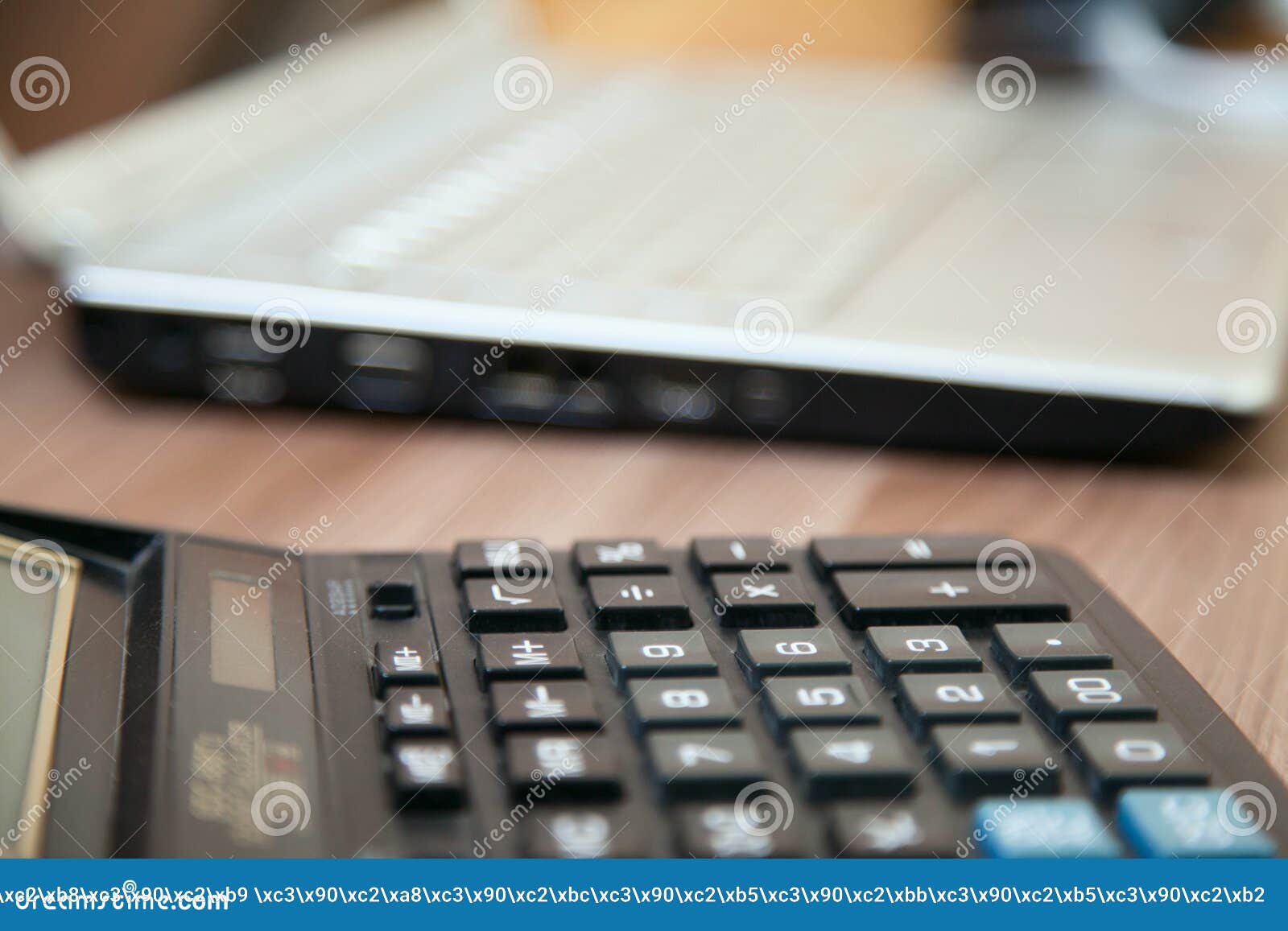 Calculator and Laptop on the Table Stock Photo - Image of game ...