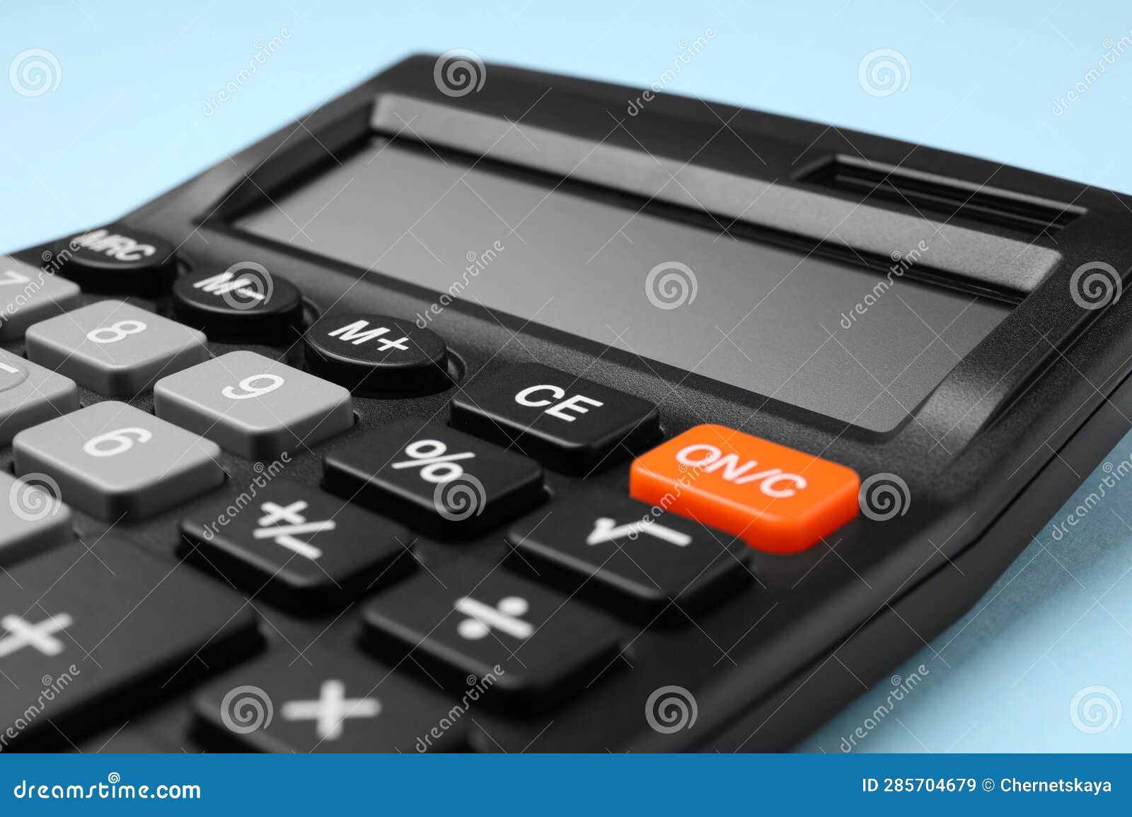 Calculator on Light Blue Background, Closeup. Office Stationery Stock ...