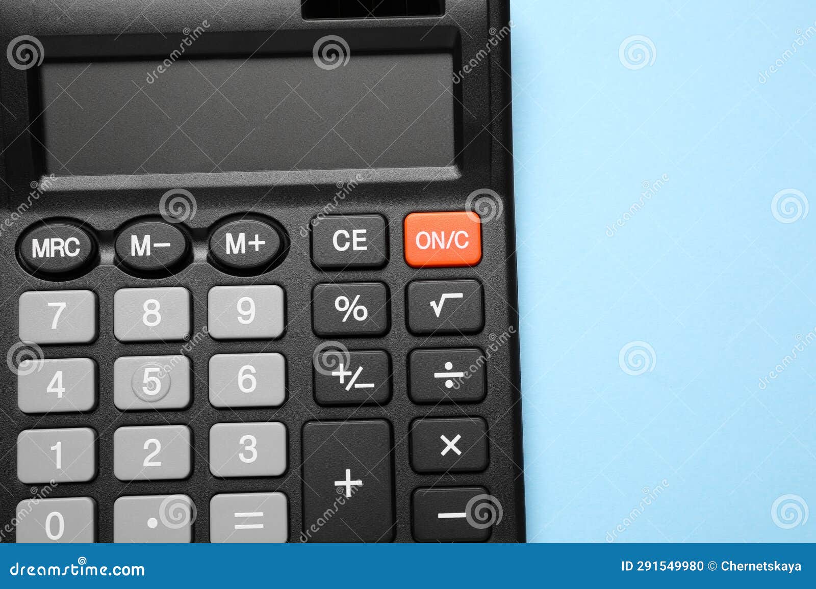Calculator on Light Blue Background, Top View. Space for Text Stock ...