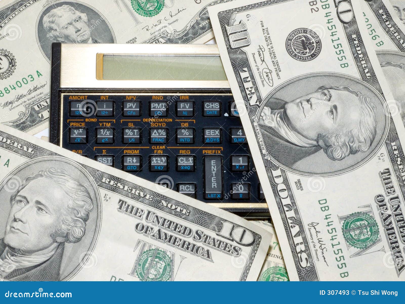 Calculator and money stock image. Image of green, tally - 307493