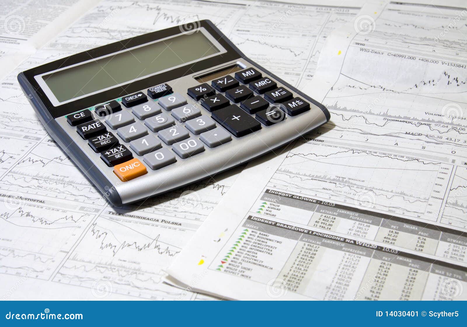 Calculator and Newspaper stock image. Image of benefits - 14030401