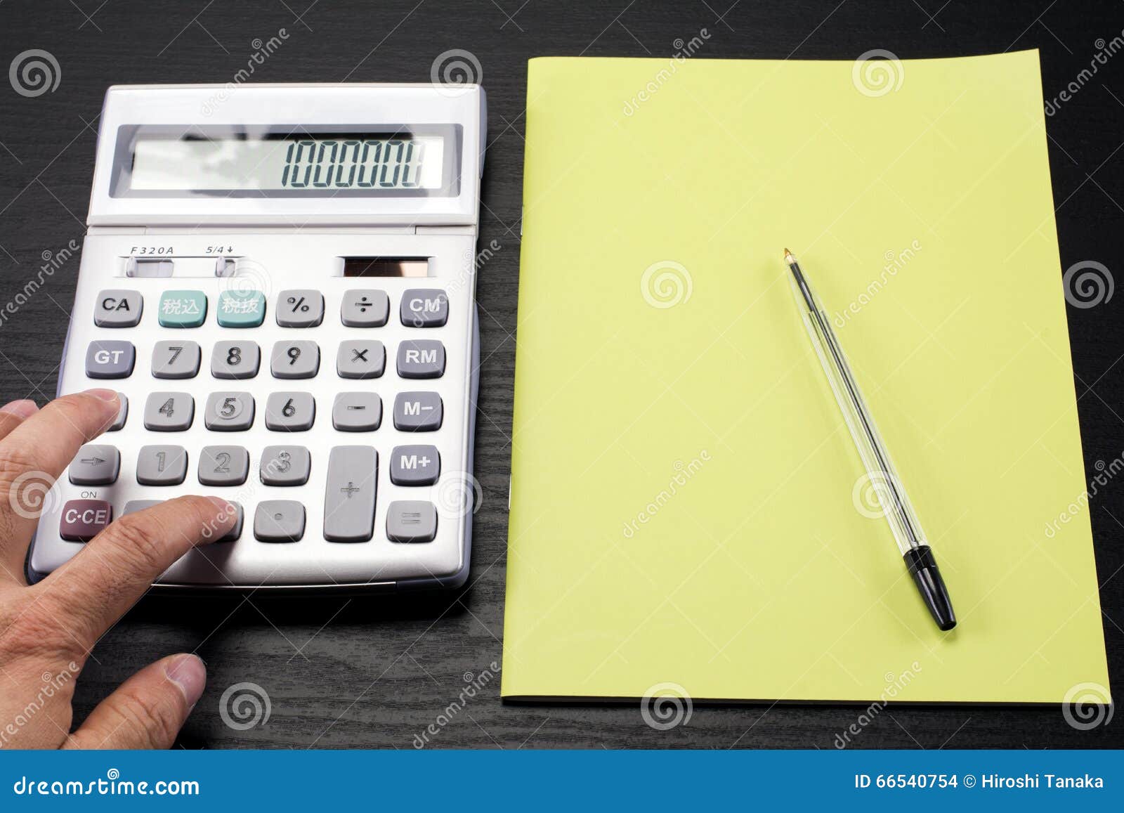 Calculator and notebook stock photo. Image of reckoning - 66540754
