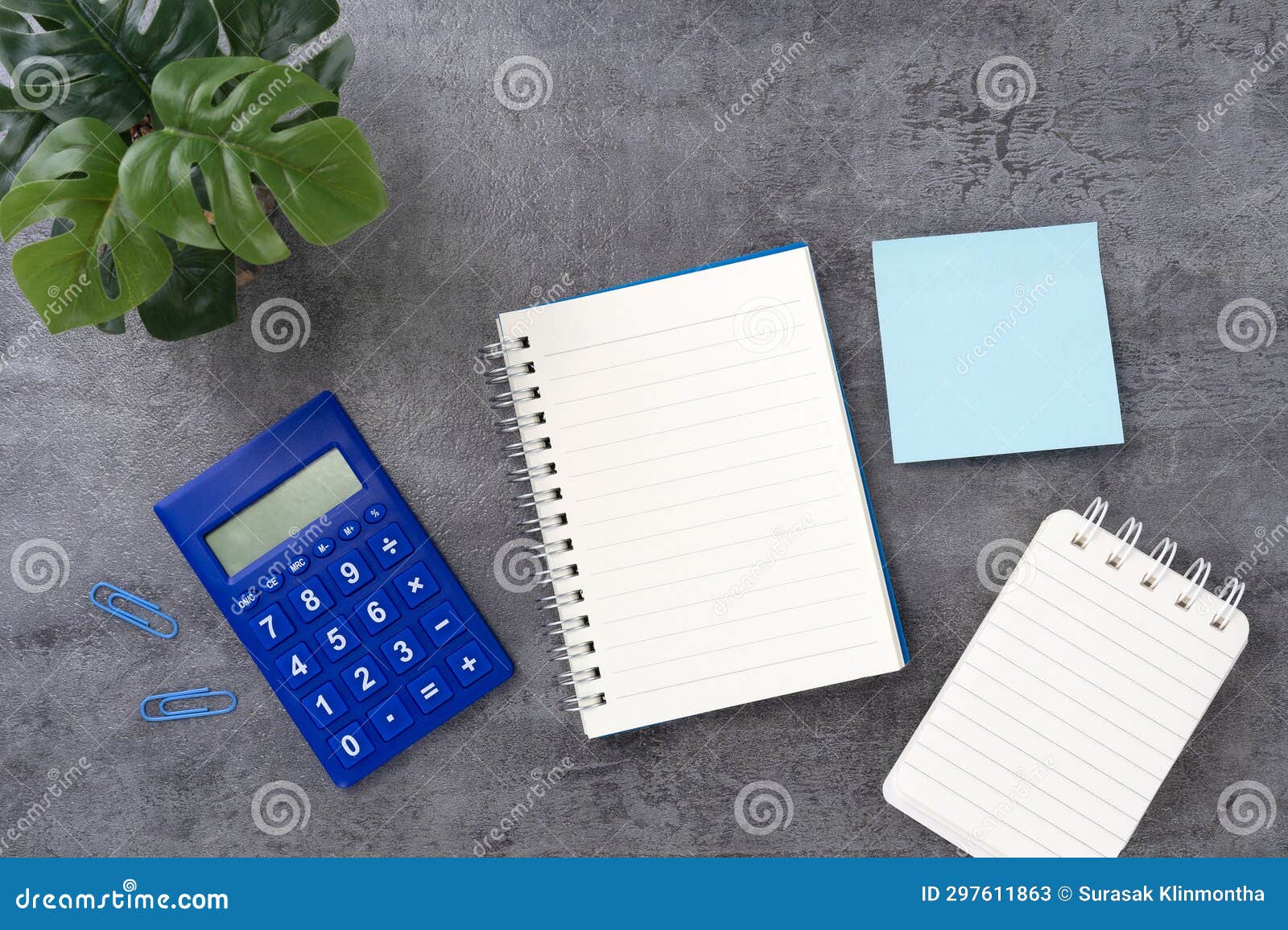 Calculator and Notebook on Stone Texture Background. Flat Lay of a ...