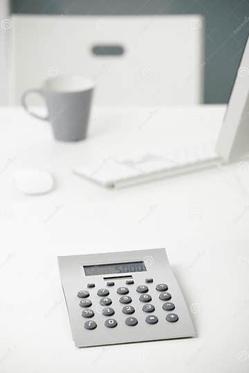 Calculator on office desk stock image. Image of indoor - 17628049