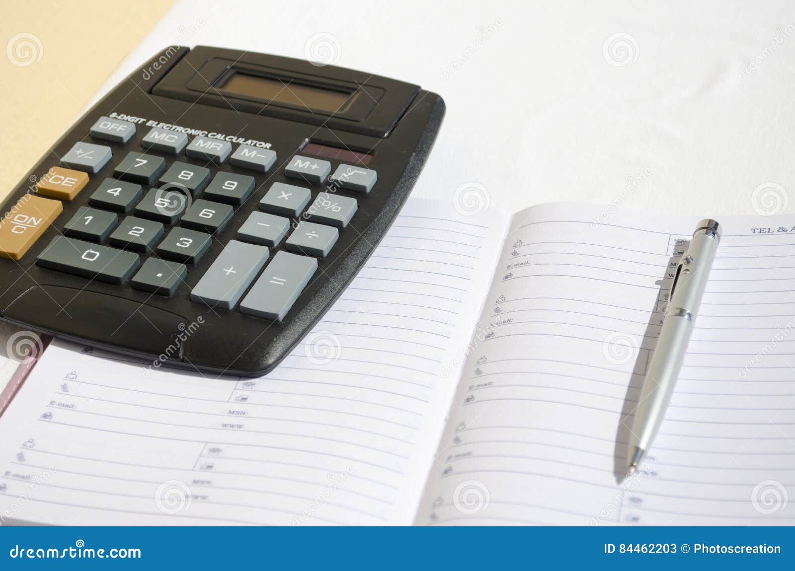 Calculator paper and pen stock image. Image of number - 84462203