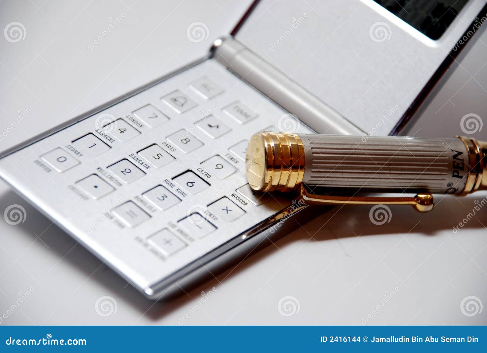 Calculator with pen stock photo. Image of smart, busines - 2416144