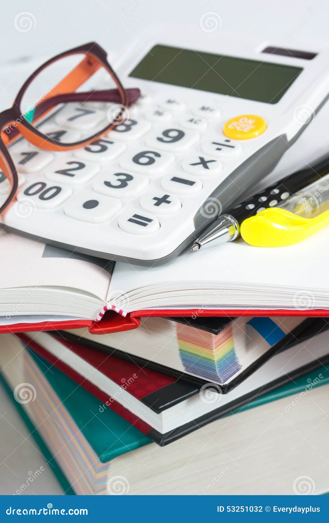 Calculator and Pen on Book Stack Stock Photo - Image of literature ...