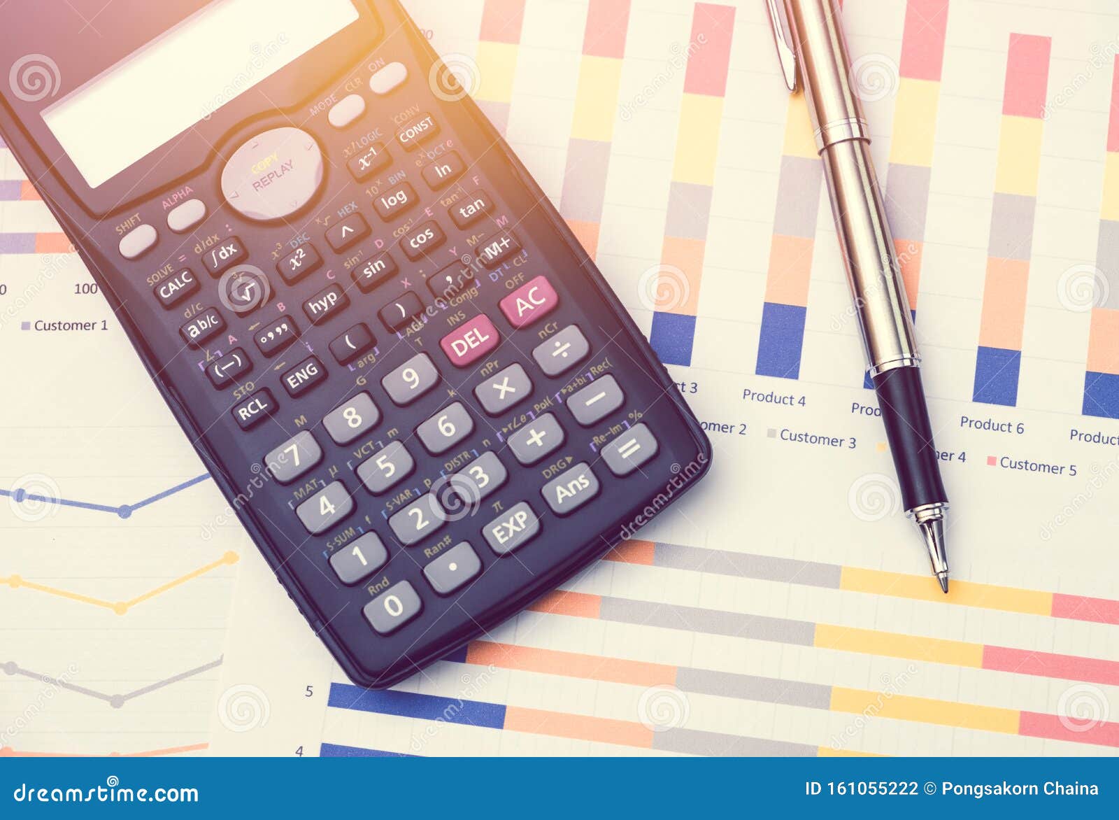 Calculator and Pen for Data Analysis from Charts and Graph Stock Photo ...