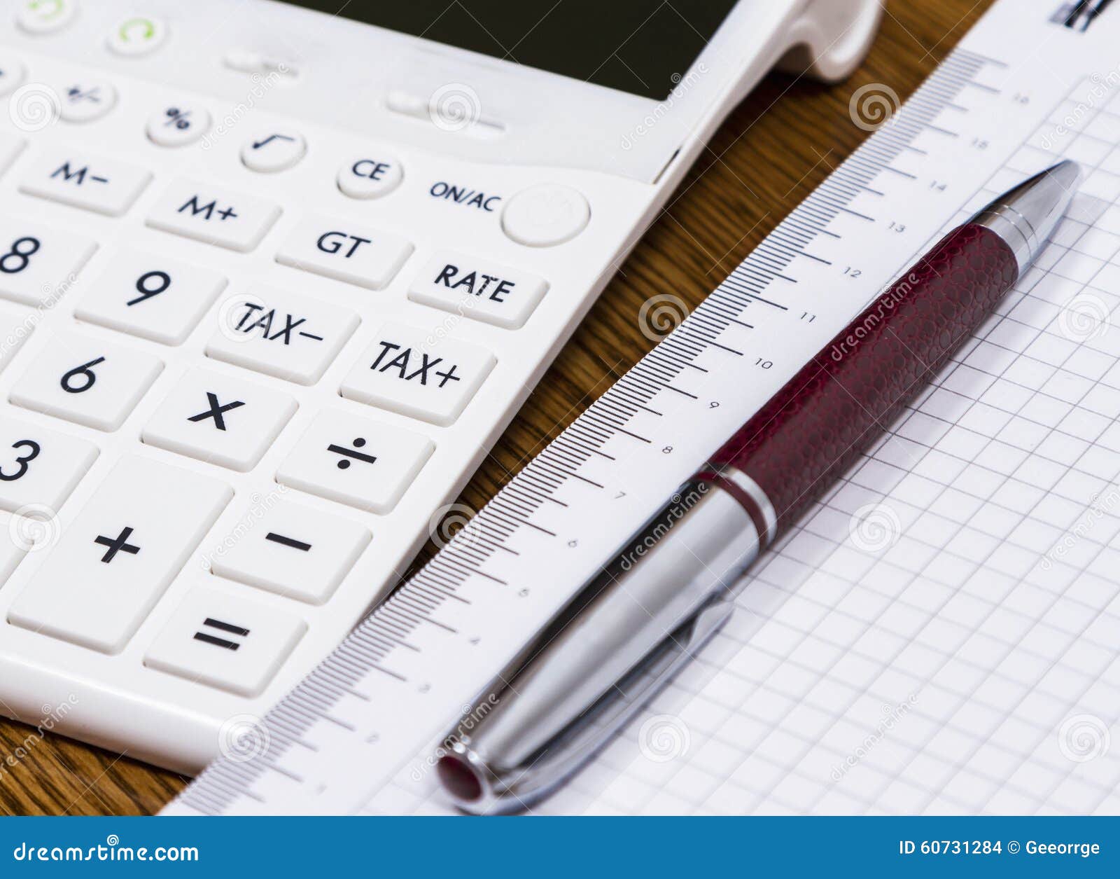 A Calculator and a Pen on Desk Stock Photo - Image of calculations ...