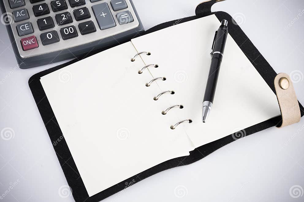 Calculator and Pen on Notebook Stock Image - Image of lined, organizer ...