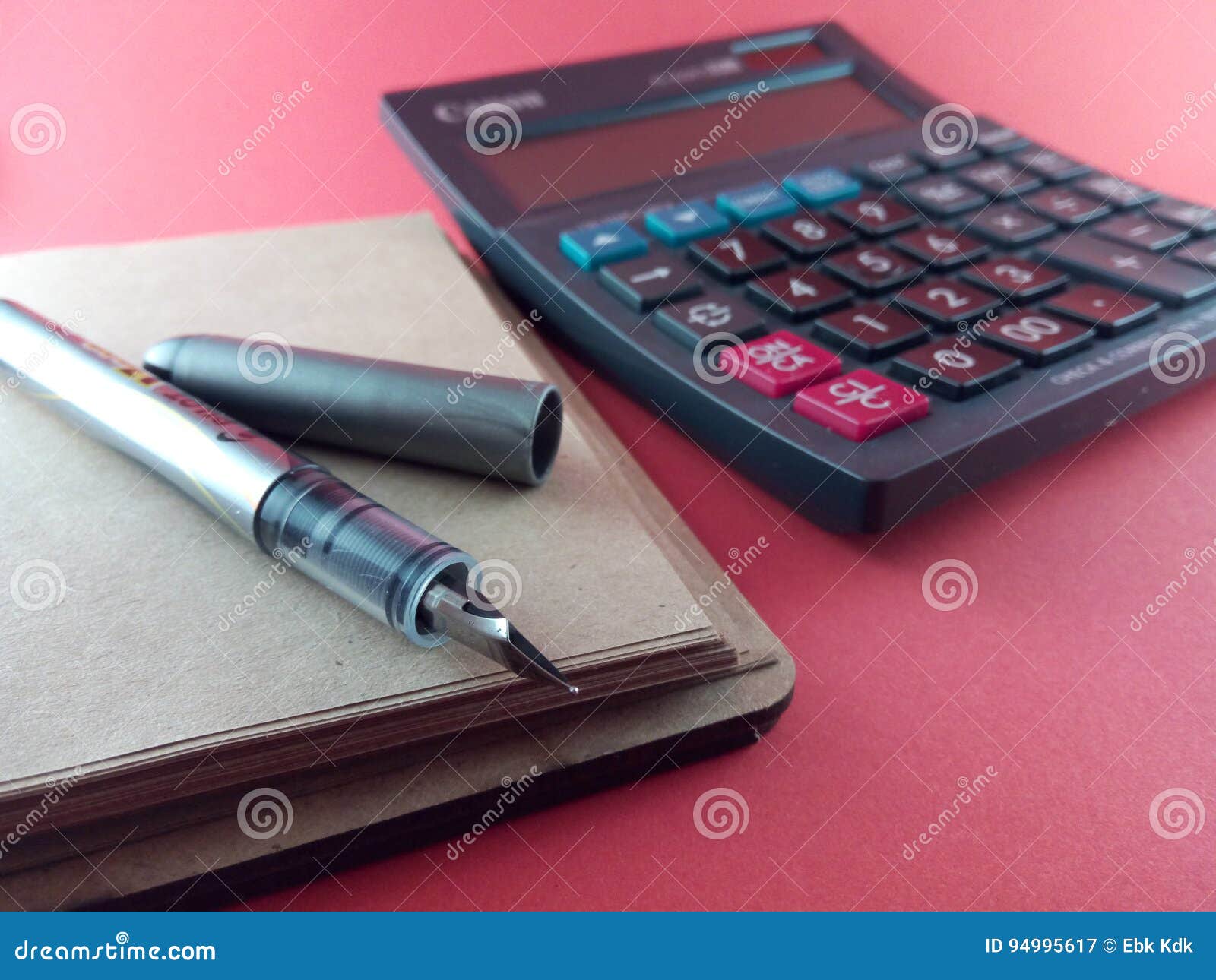 Calculator and Pen on Paper Notepad Stock Image - Image of background ...
