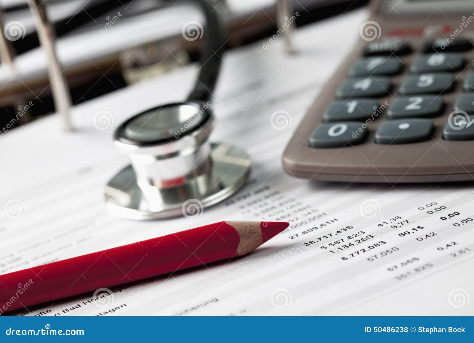Calculator with Pen and Stethoscope and Form, Close Up Stock Photo ...