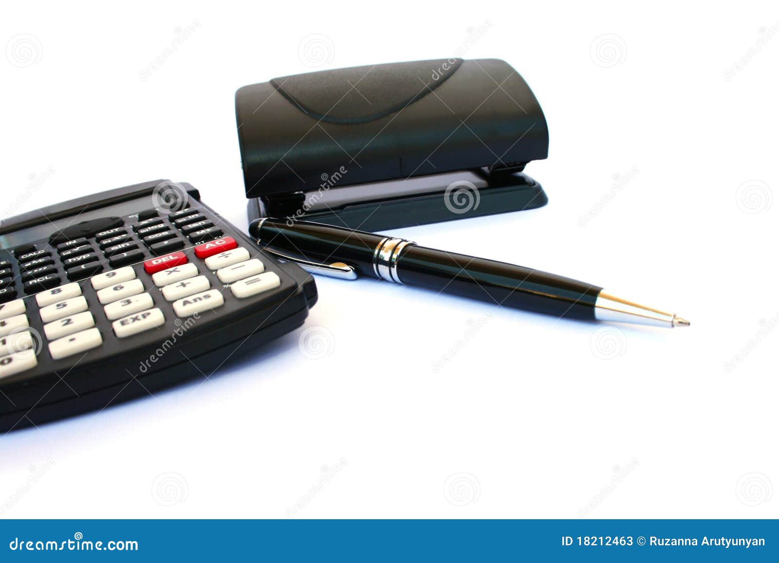 Calculator,puncher and pen stock image. Image of divide - 18212463