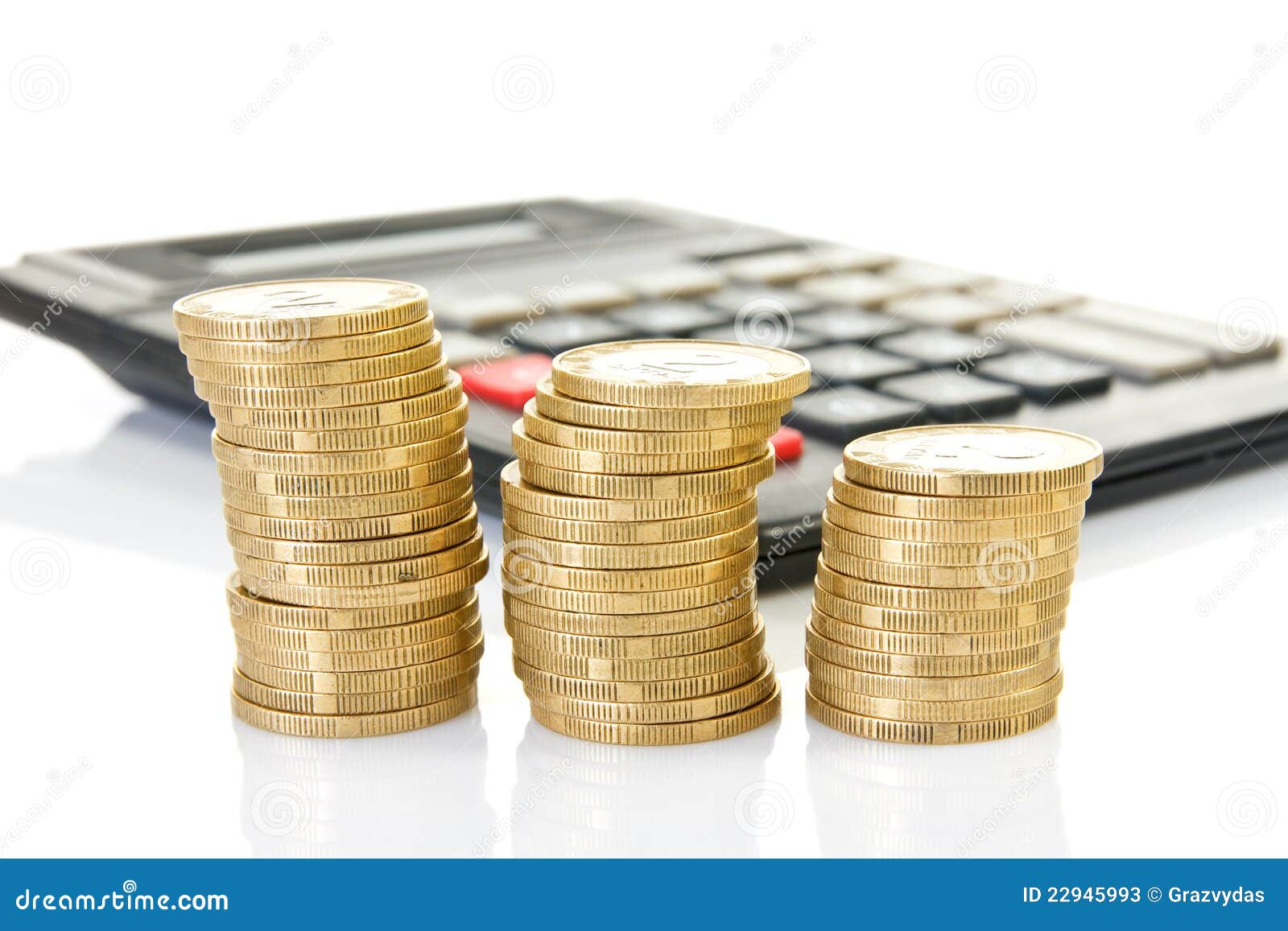 Calculator and Three Stacks of Coins Stock Image - Image of investment ...