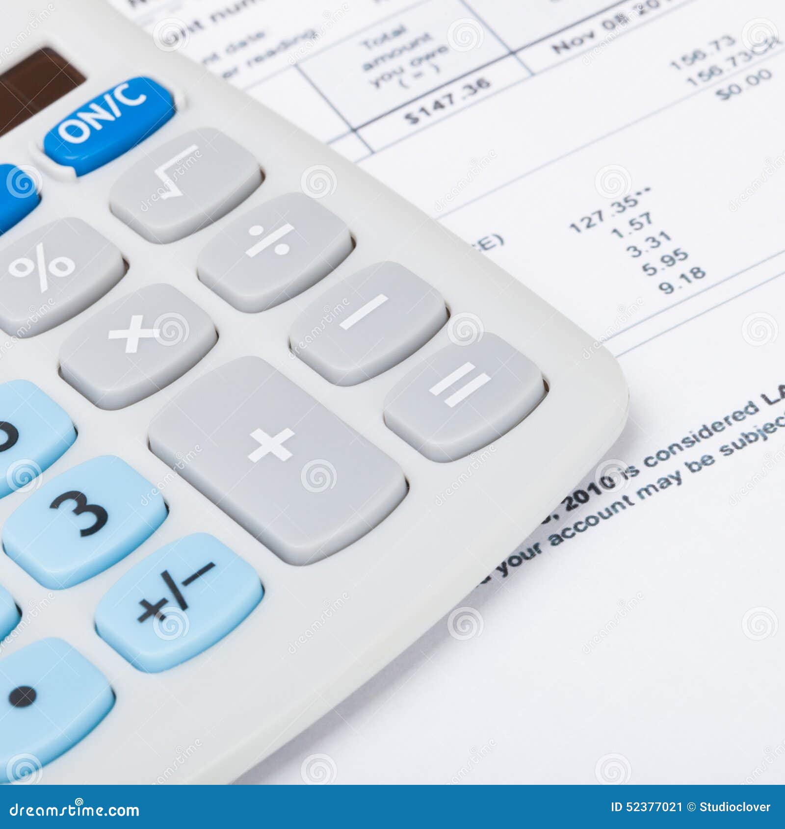 Calculator and Utility Bill Under it - Close Up Shot Stock Image ...
