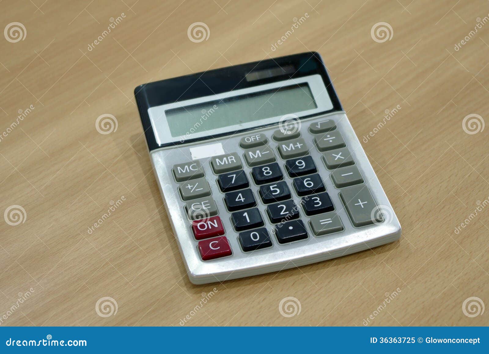 Calculator on wood table stock image. Image of financial - 36363725