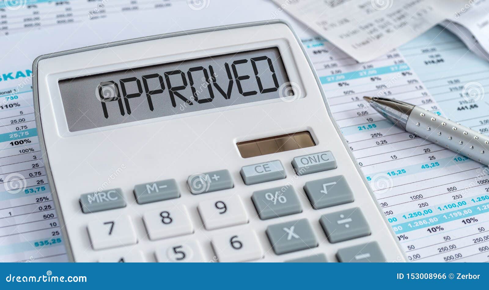A Calculator with the Word Approved on the Display Stock Photo - Image ...