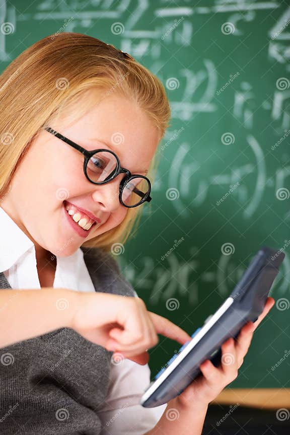 Calculators Make Maths Fun. a Cute Blonde Girl Using a Calculator in ...