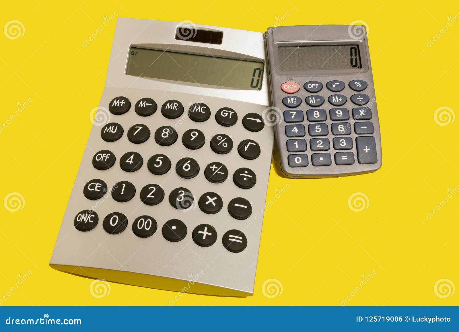 Calculators on a Yellow Surface Stock Photo - Image of keypad, maths ...