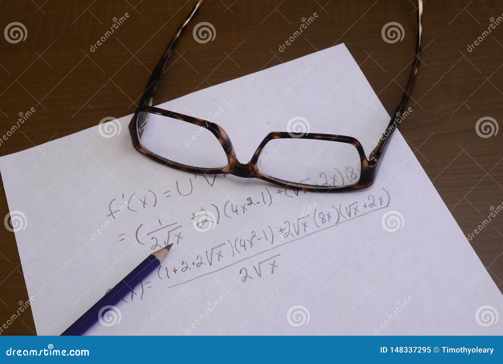 Calculus Problem Being Worked Out To Find a Solution with Paper and ...