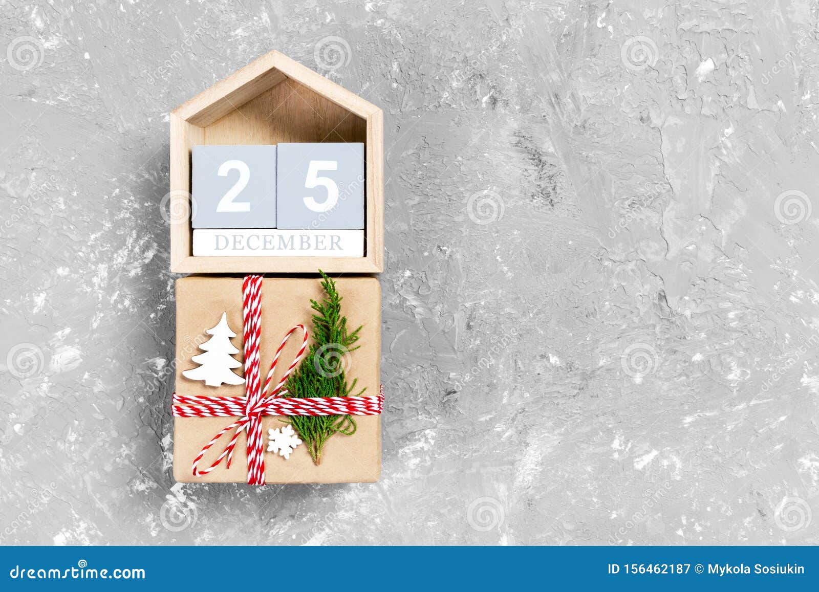 Calendar with Date 25 December and Gift Boxes on Color Background ...