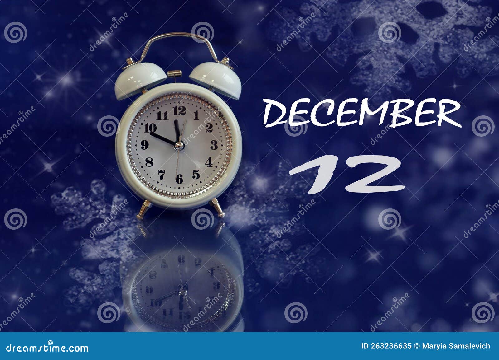 Calendar for December 12: White Alarm Clock on a Blue Background with ...