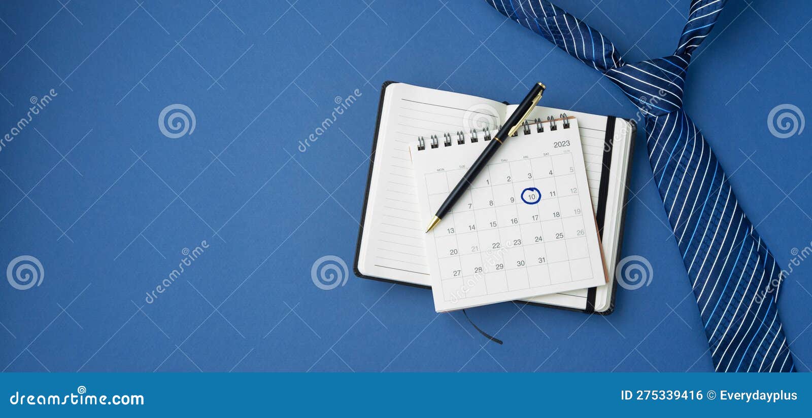 Calendar with Marked Date on Notebook with Tie on Blue Background Stock ...