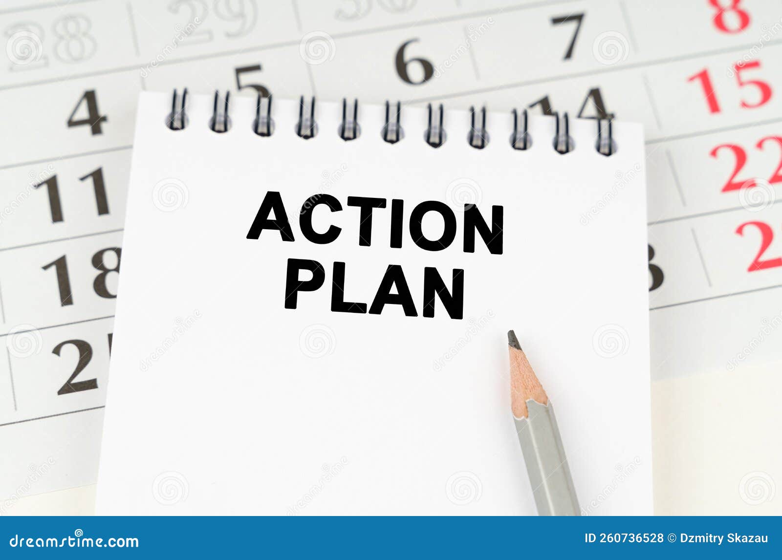 On the Calendar is a Notebook with the Inscription - ACTION PLAN Stock ...