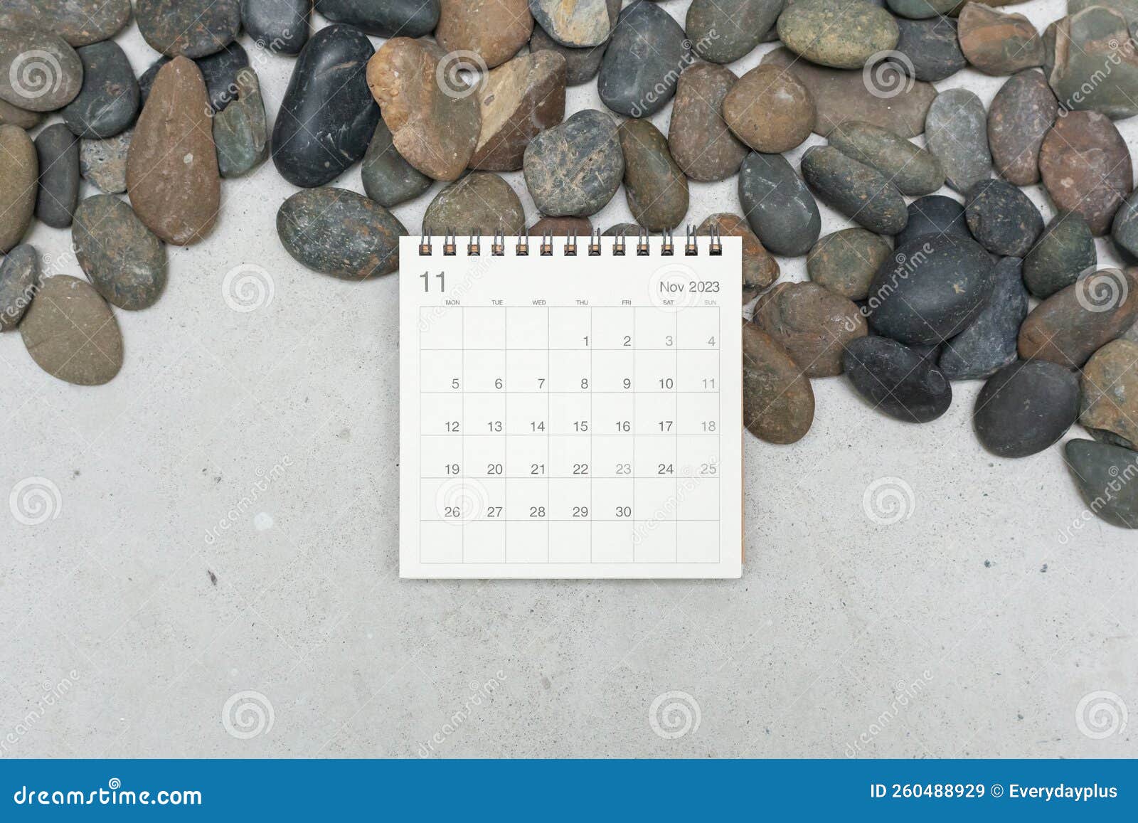 Calendar with Pebble Stone on Concrete Background Stock Image - Image ...