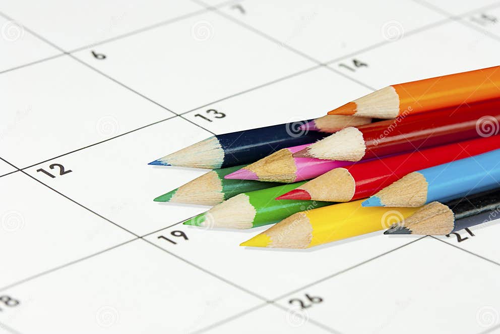 Calendrier et crayons photo stock. Image du affaires - 21905526