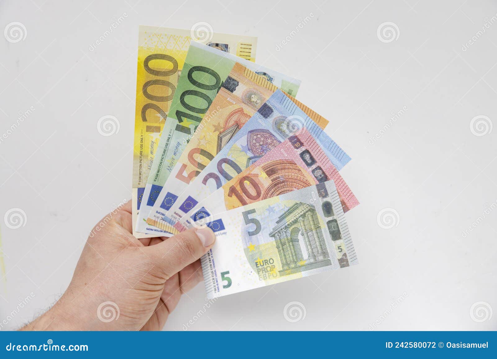 A Person Holding Euros Banknotes on a Clear Background Editorial ...
