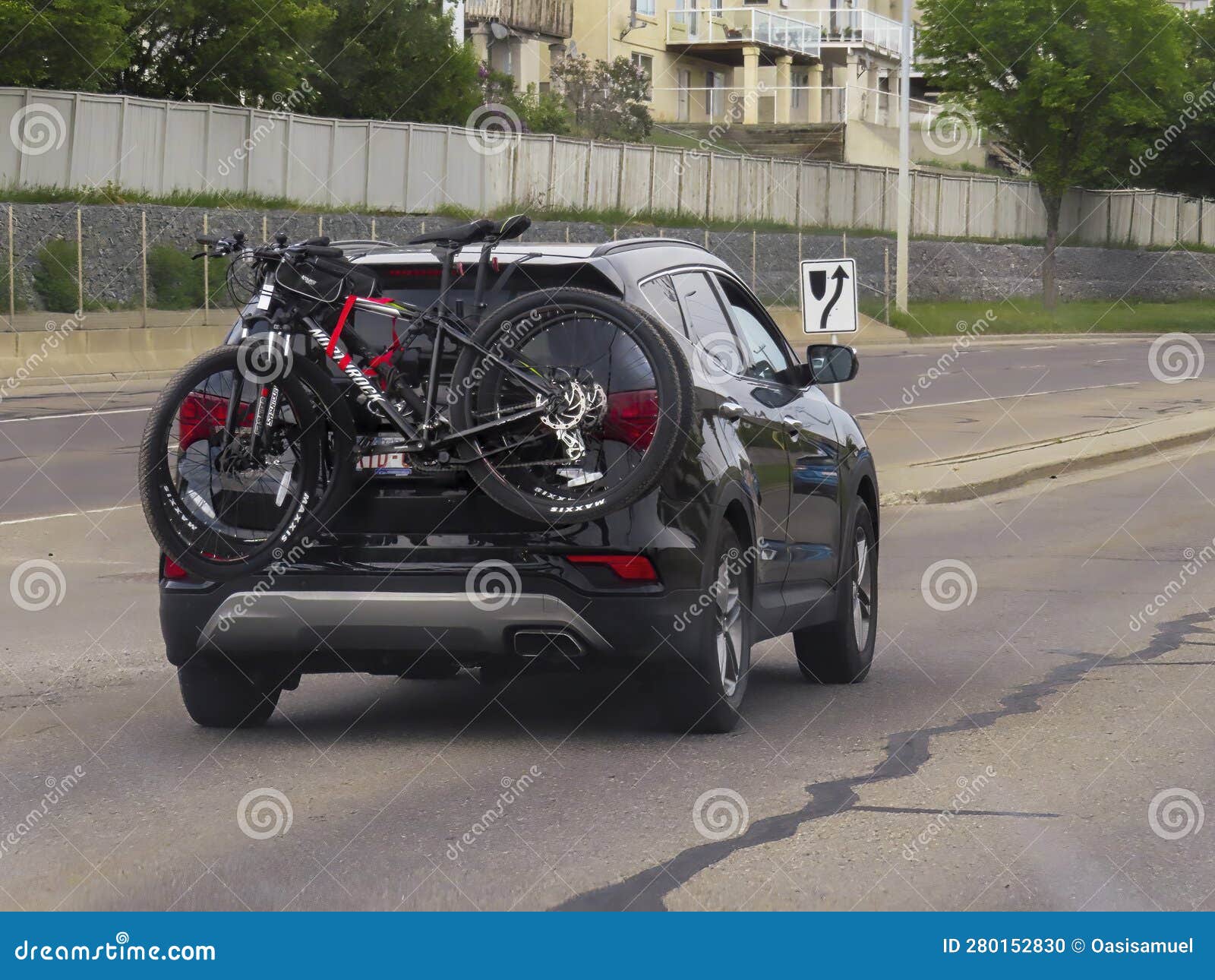 A Car with a Couple of Bicycles on the Back Editorial Image - Image of ...