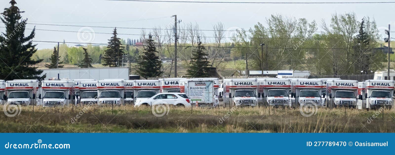 Front View Panoramic of Several U-Haul Trucks Parked in a Storage ...