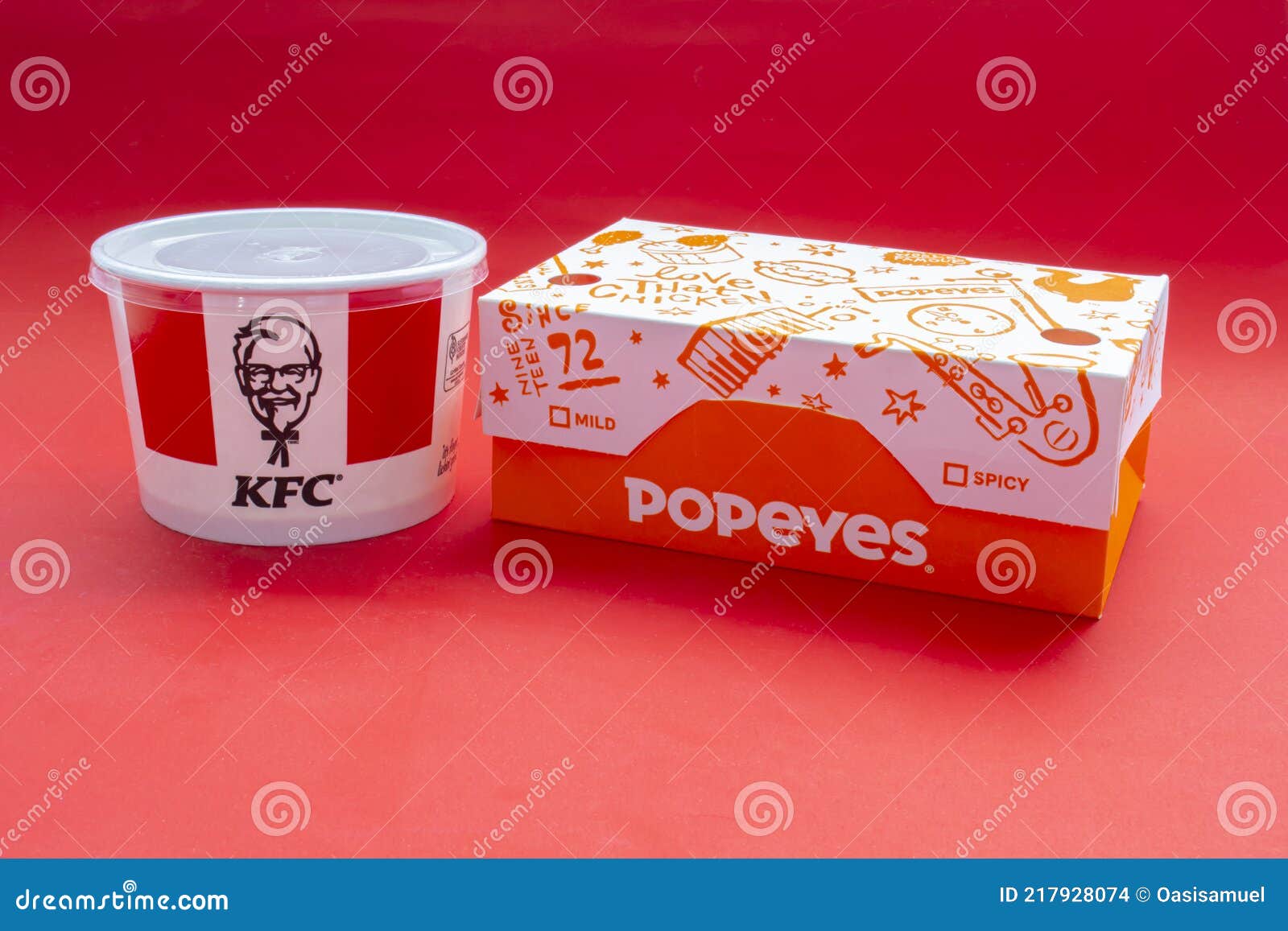 KFC and Popeyes Fast Food Boxes on a Red Background Editorial Stock ...