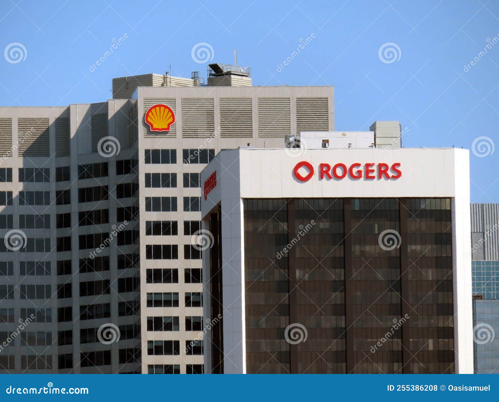 A Rogers and Shell Sign Buildings in Calgary Downtown Editorial Stock ...