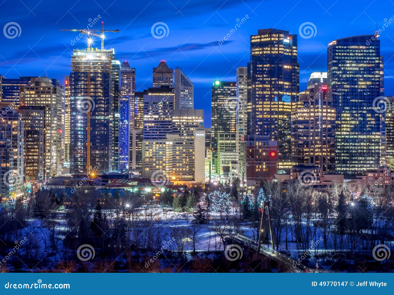 Calgary Skyline at Night with Bow River Editorial Photography - Image ...