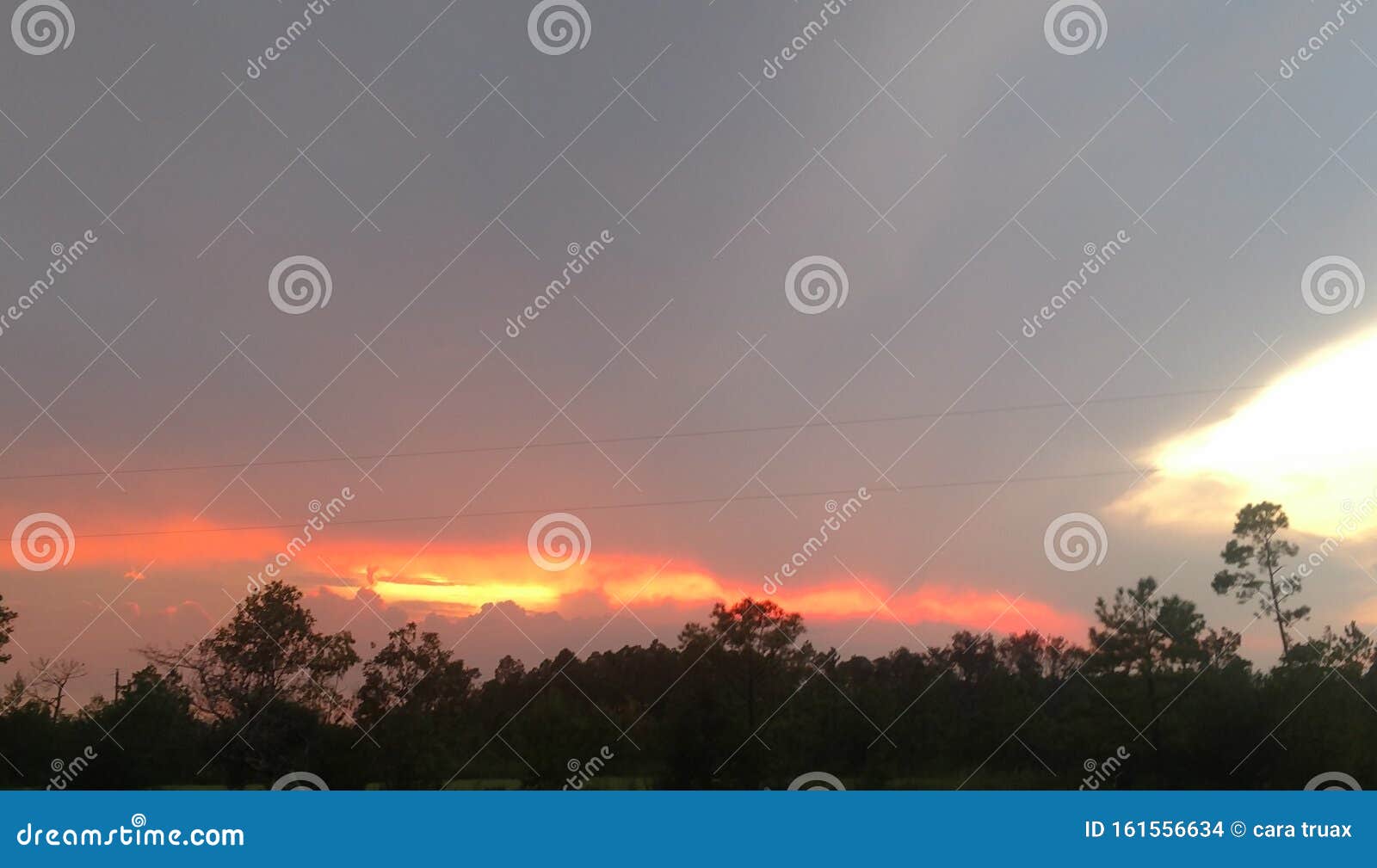 Calhoun county sunset stock photo. Image of sunset, clouds - 161556634