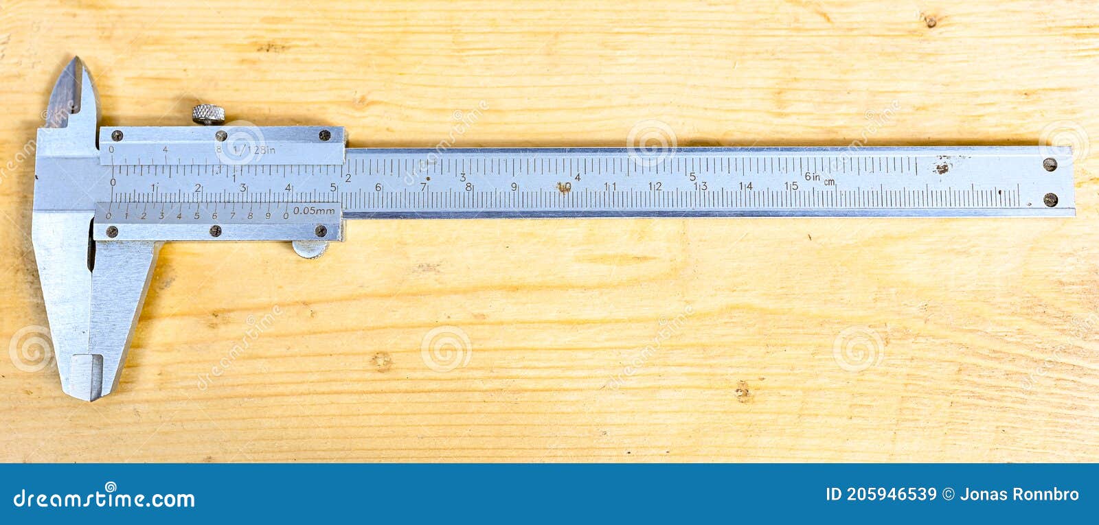 Caliper with Centimeter and Millimeter on Wooden Bench Stock Image ...