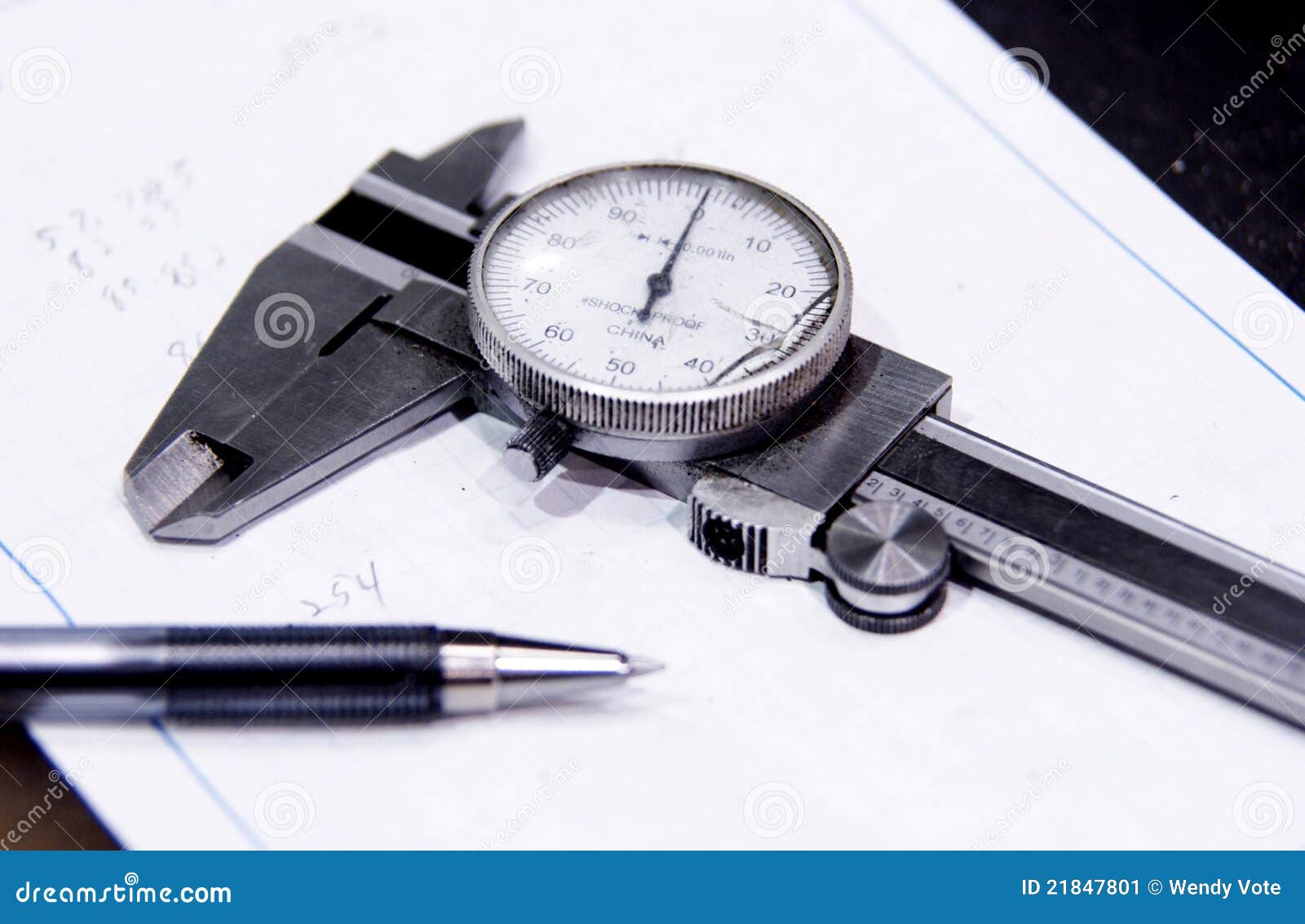 Caliper Pen and Pad on Work Table Stock Image - Image of caliper ...