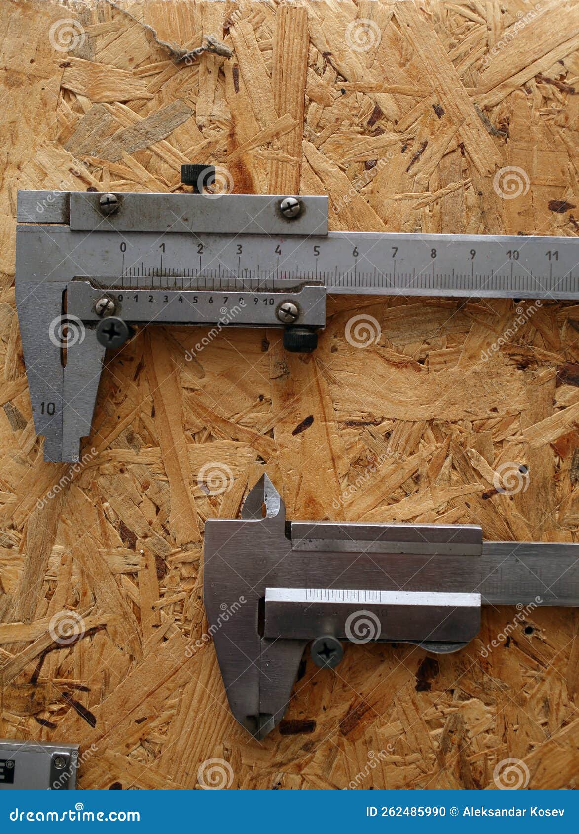 Two calipers on wall stock photo. Image of scale, ruler - 262485990